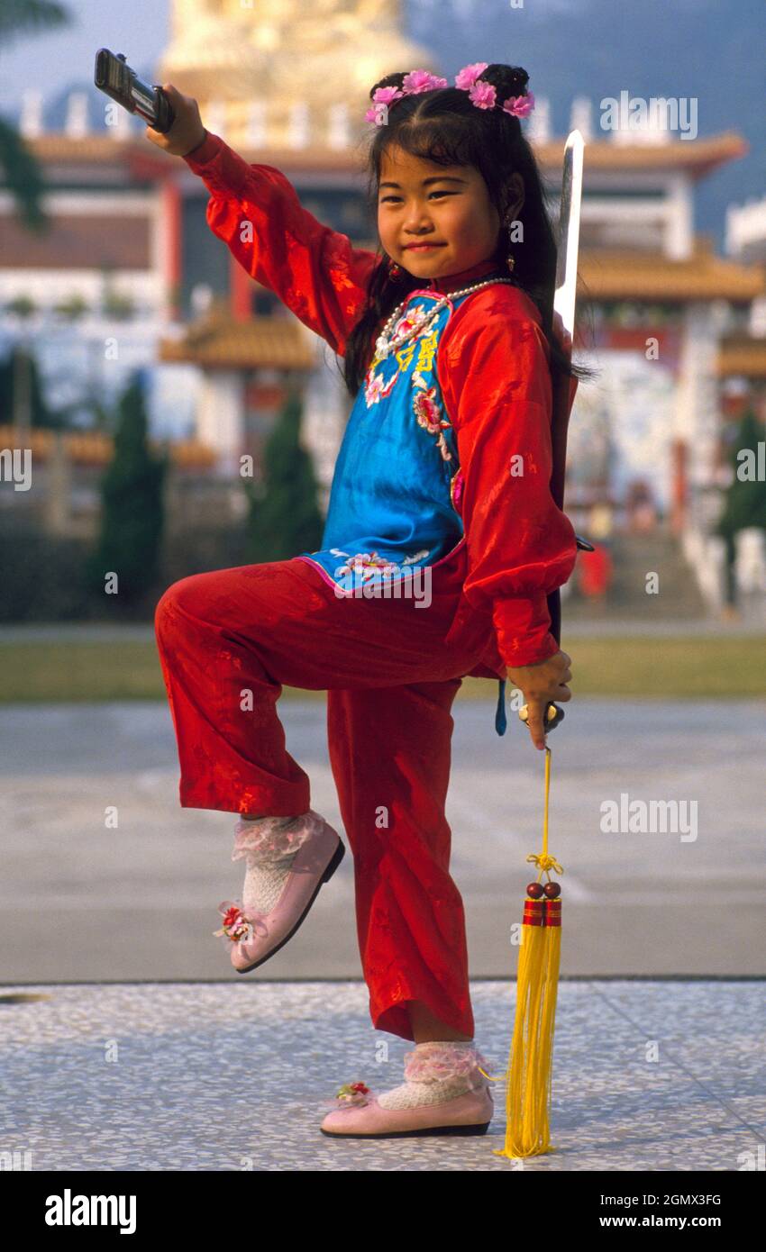 Tapei, Taiwan - 24 January 1986; Smiling young girl in costume ...