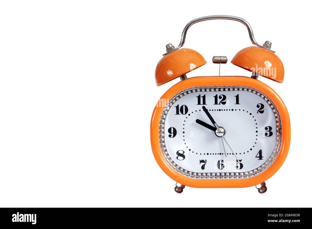 Orange alarm clock on a white background Stock Photo - Alamy