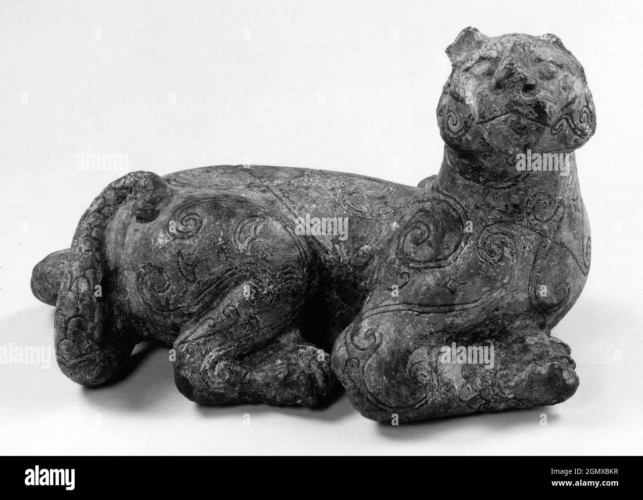Ornament in the Form of a Reclining Tiger. Period: Eastern Zhou dynasty ...