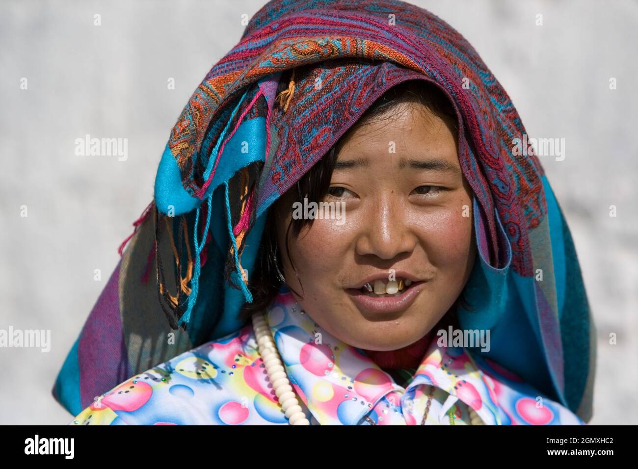 Lhasa, Tibet - 20 October 2006; one woman in-shot A woman's face that ...