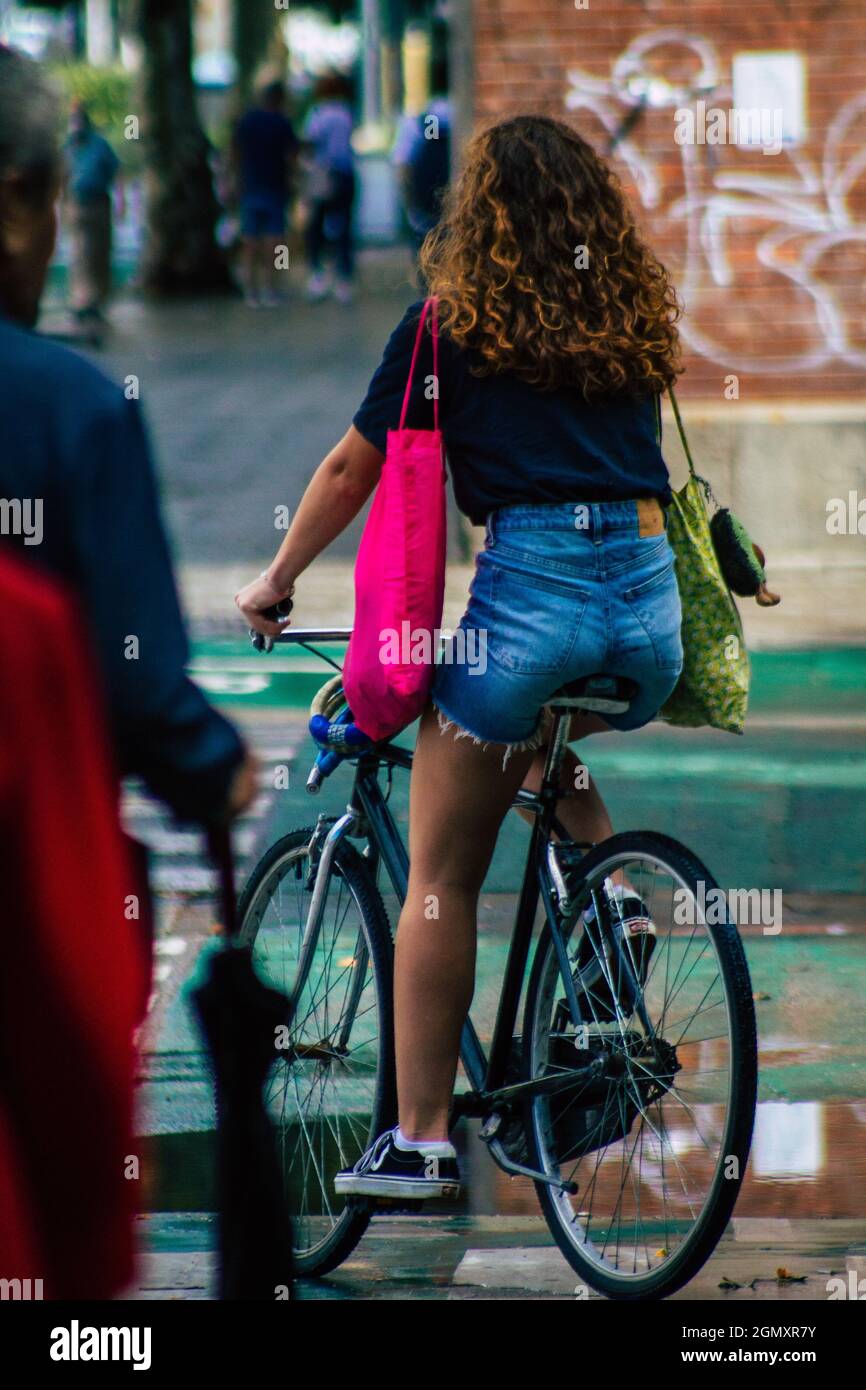 Seville Spain September 15, 2021 People rolling with a bicycle in the ...