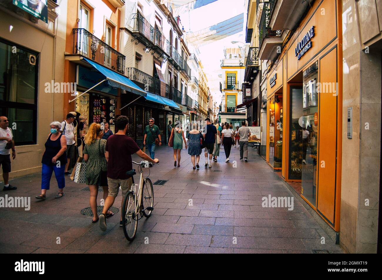 Seville Spain September 18, 2021 Pedestrians walking in the street ...