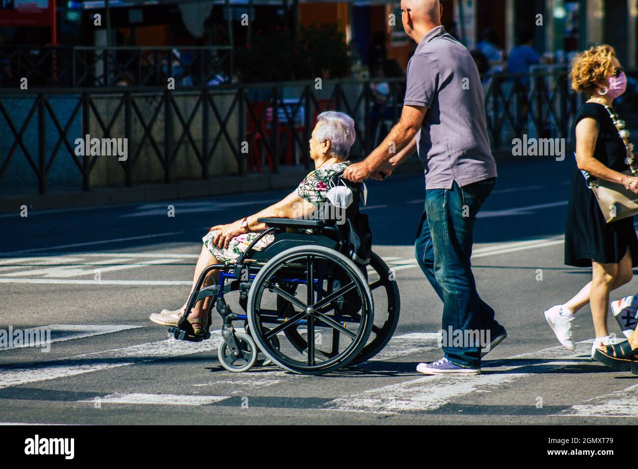 Seville Spain September 18, 2021 Pedestrians walking in the street ...