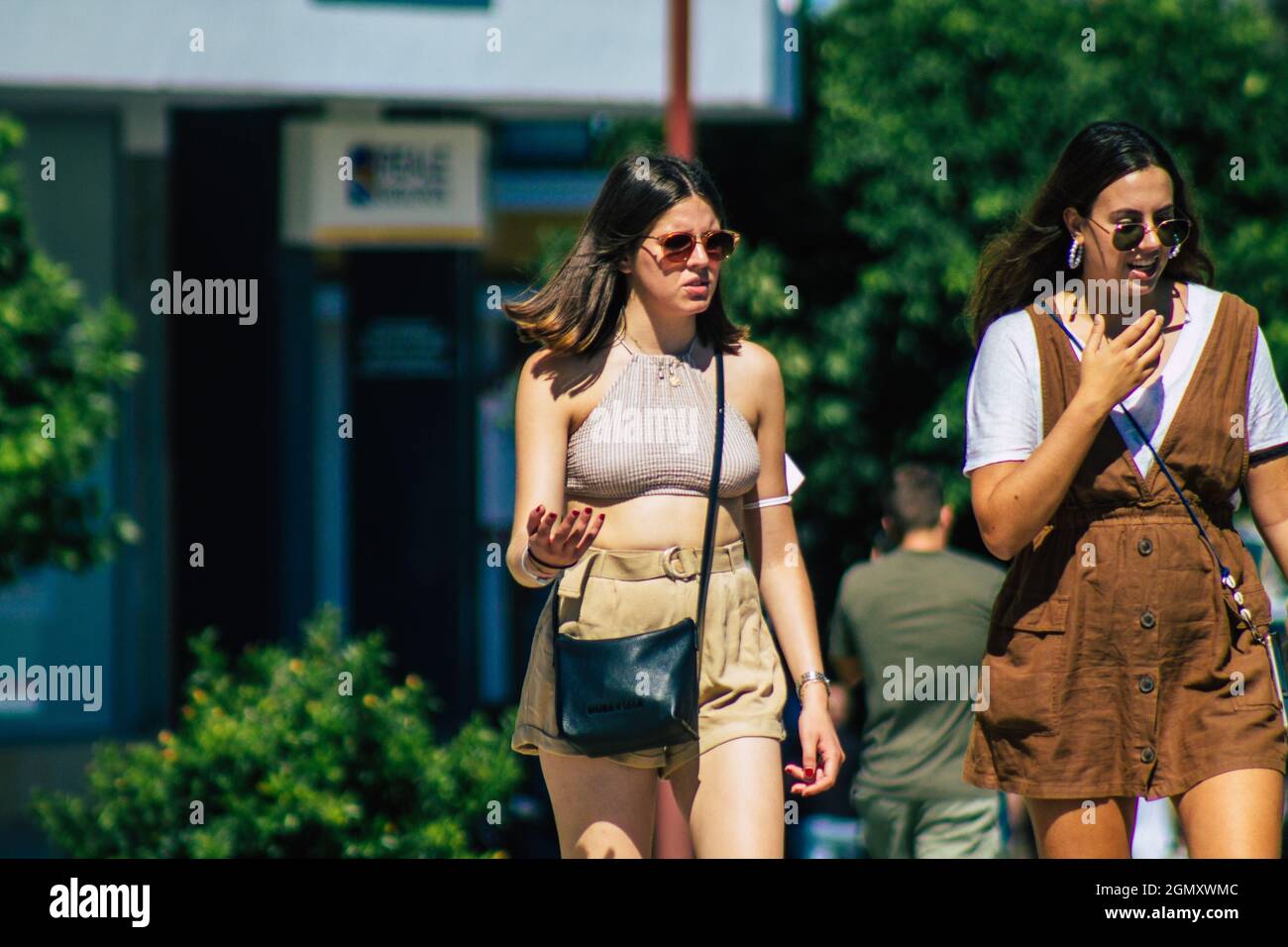 Seville Spain September 18, 2021 Pedestrians walking in the street ...