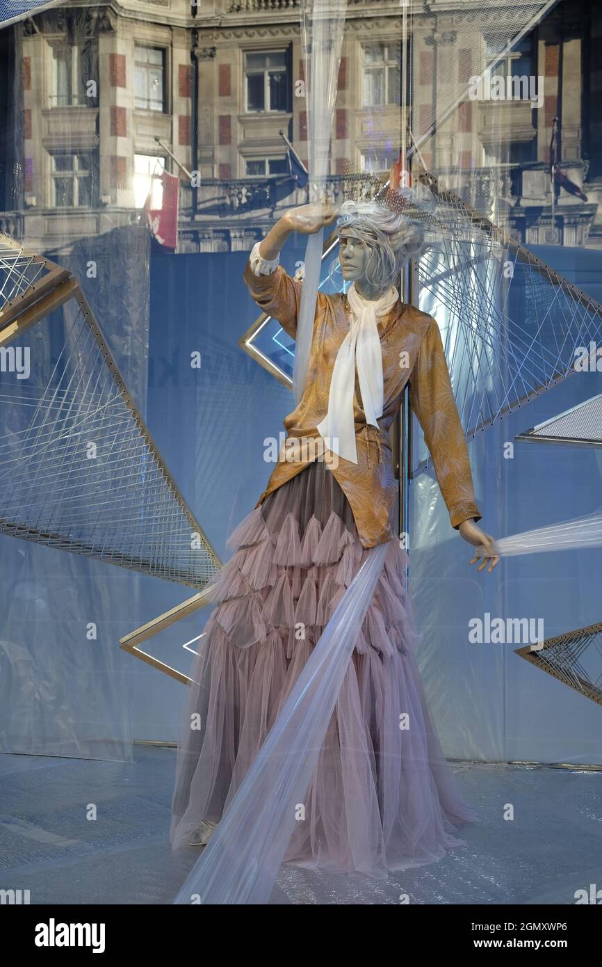 A window display showing a mannequin Stock Photo - Alamy