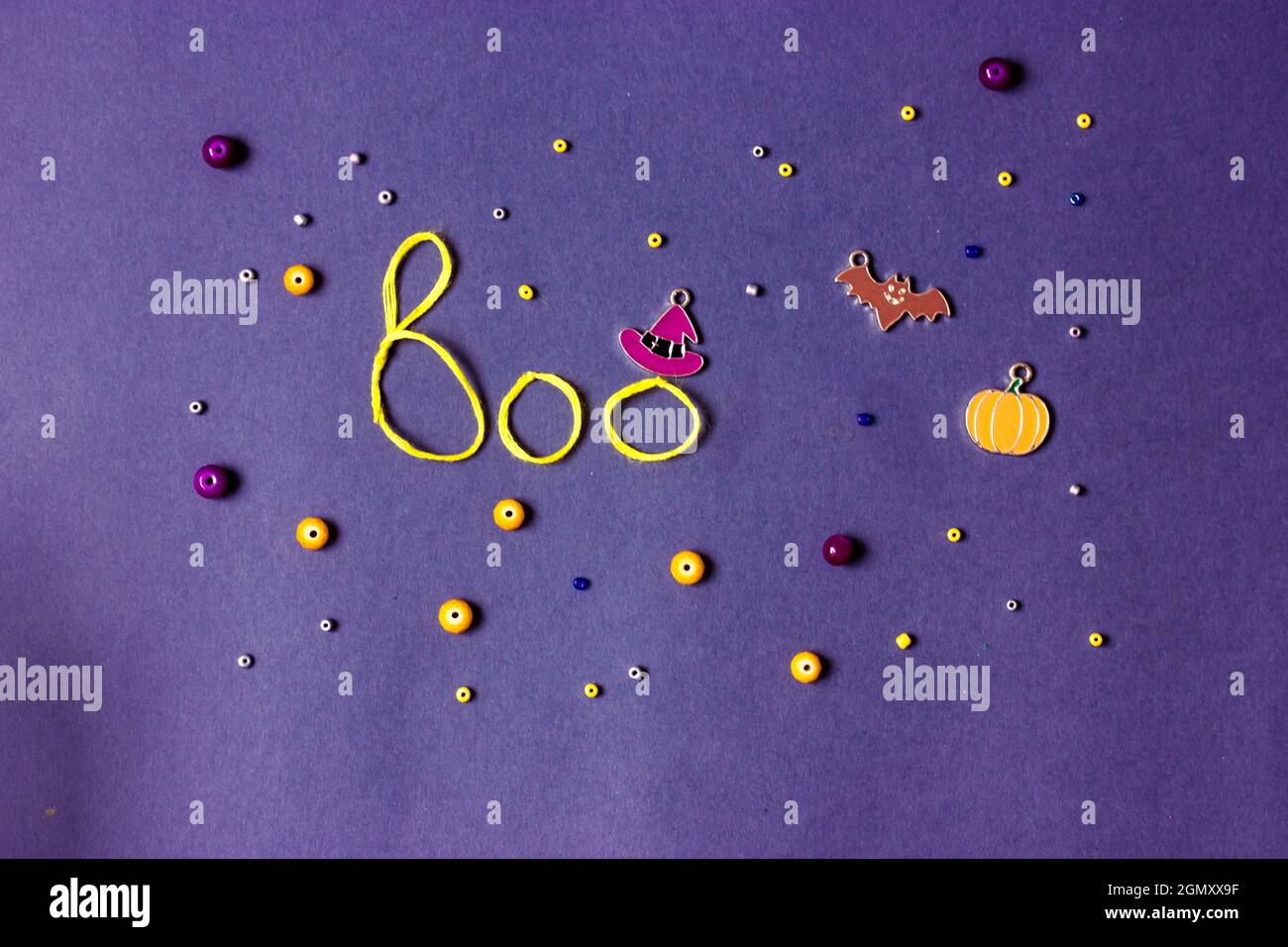 Boo word on purple background. Halloween. Bat, jack o lantern pumpkin ...
