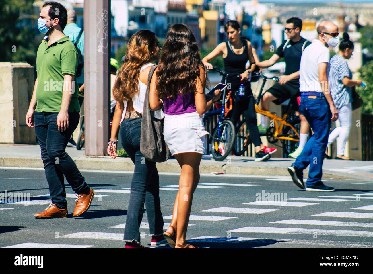 Seville Spain September 18, 2021 Pedestrians walking in the street ...