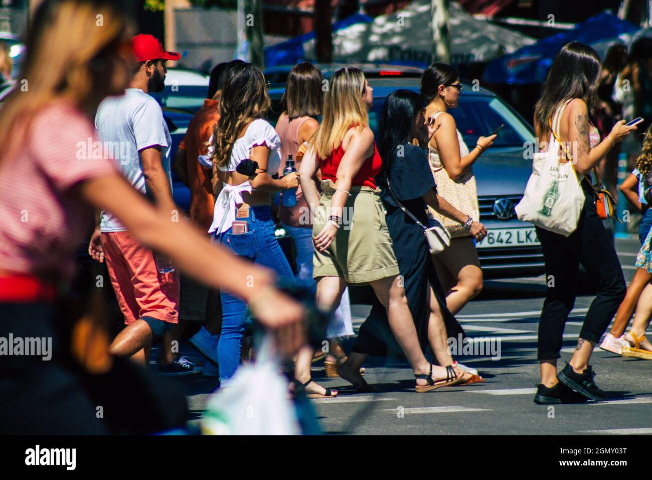 Seville Spain September 18, 2021 Pedestrians walking in the street ...