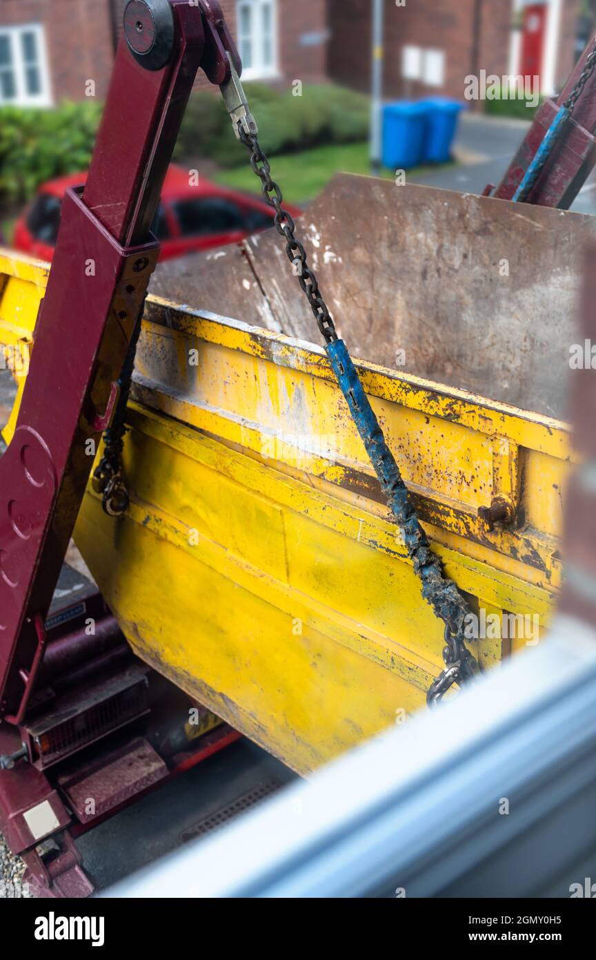 Big Yellow rubbish skip Stock Photo - Alamy