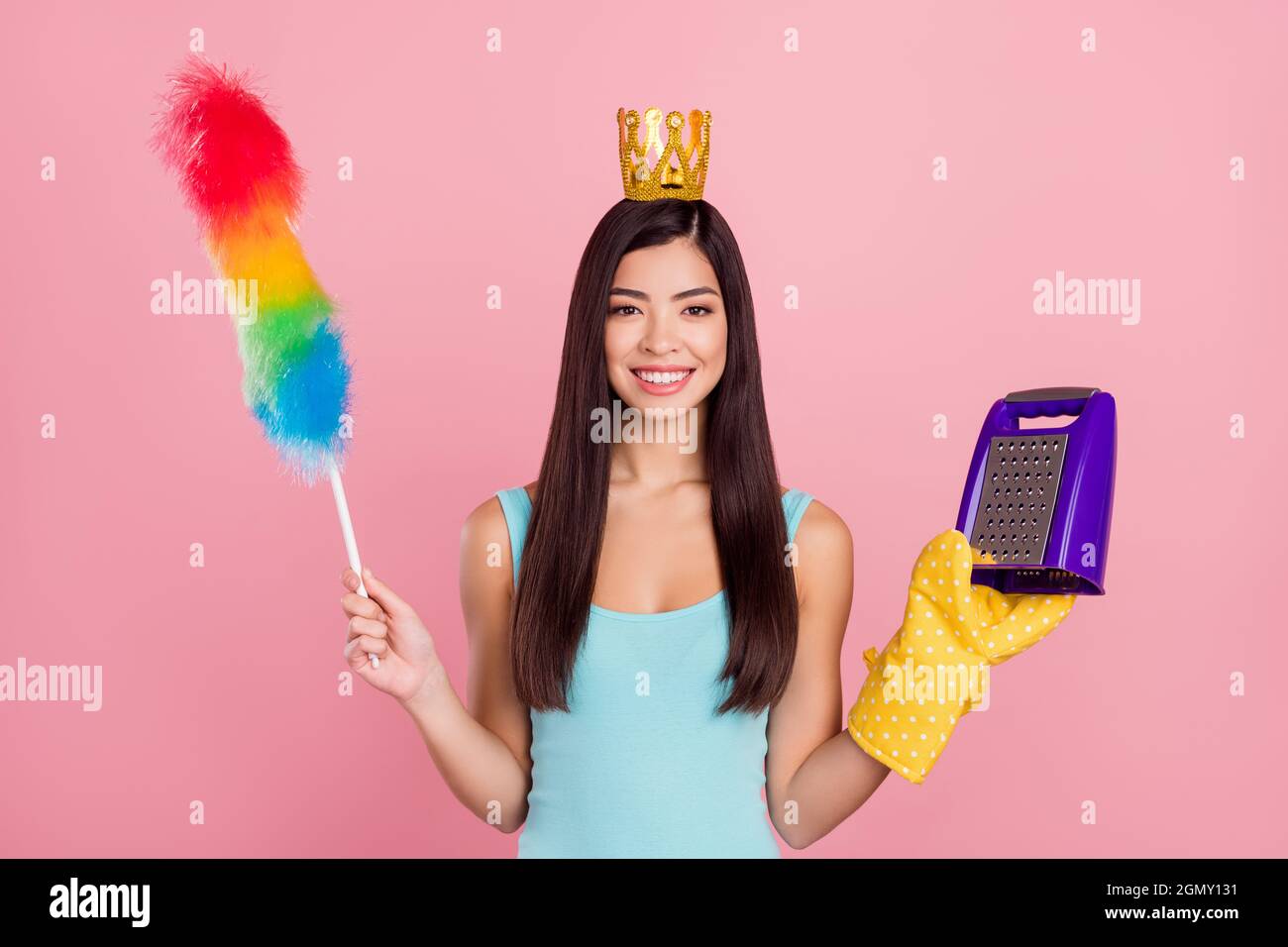 Photo of pretty young long hairdo lady clean up do housework wear crown ...
