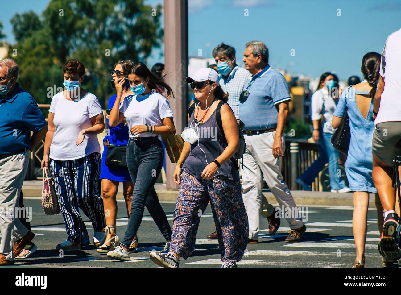 Seville Spain September 18, 2021 Pedestrians walking in the street ...