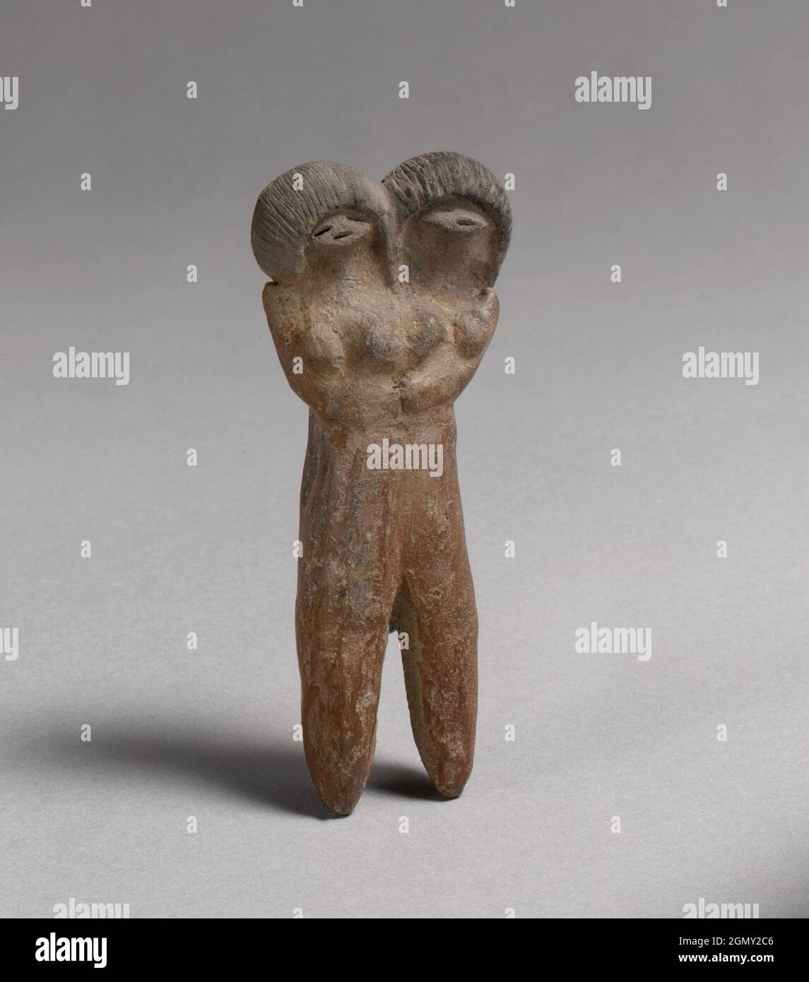 Double headed figure hi-res stock photography and images - Alamy