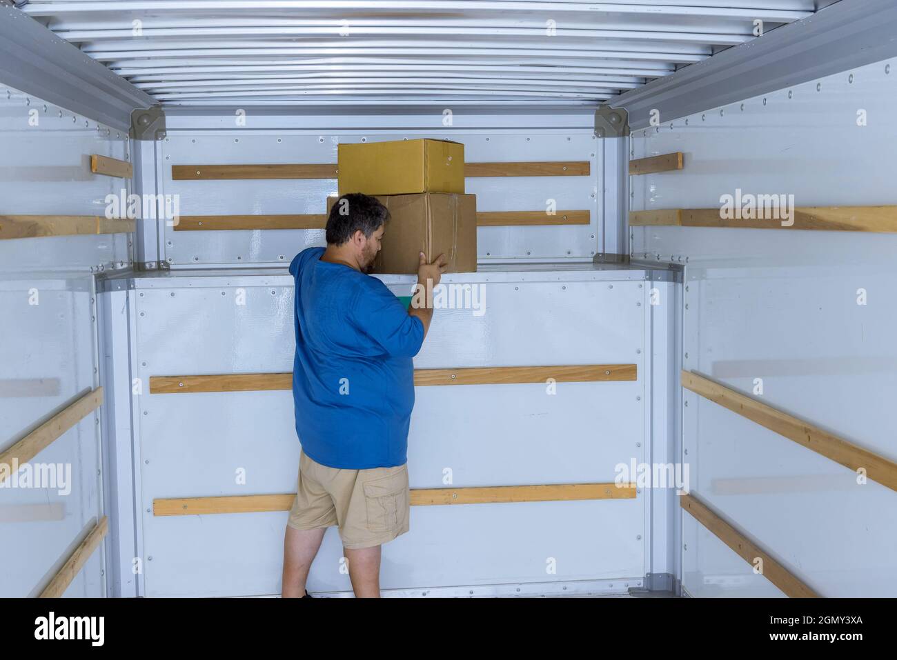 Packages delivery cardboard boxes on transportation system in car Stock ...