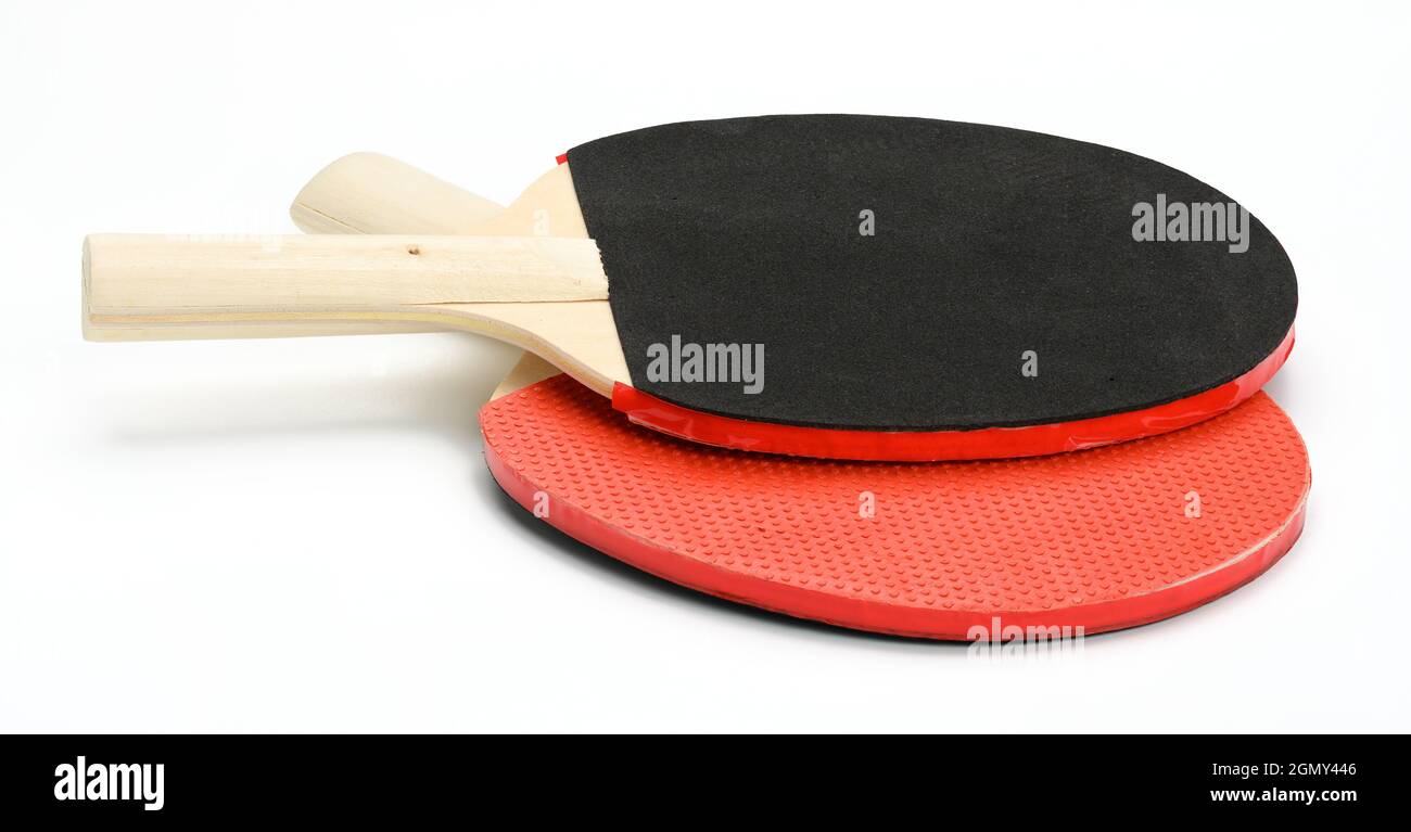 pair of wooden ping pong rackets on white background. Sport equipment ...