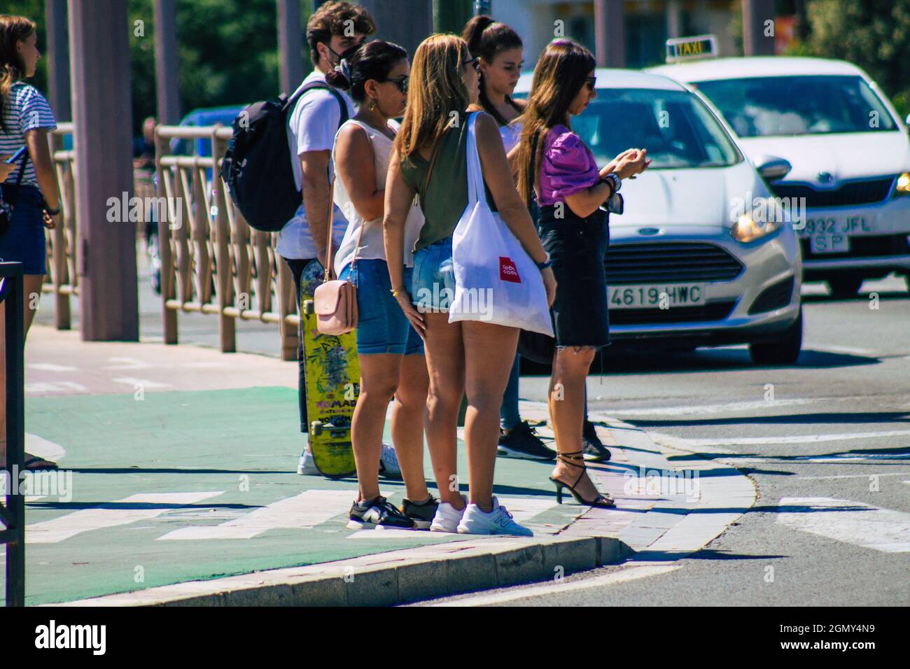Seville Spain September 18, 2021 Pedestrians walking in the street ...