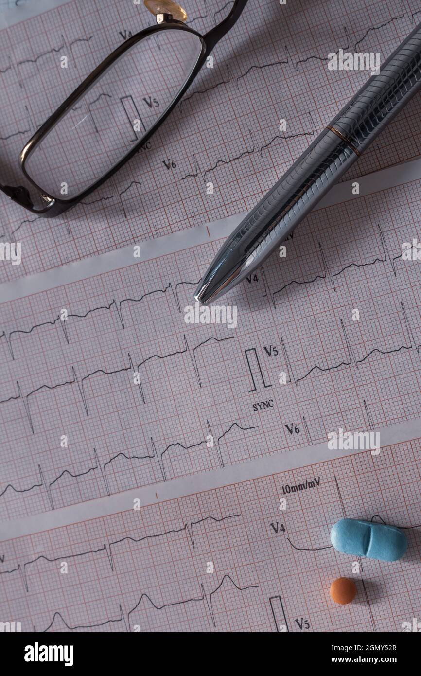 Desk of a doctor. Elements that a cardiologist uses in his work ...