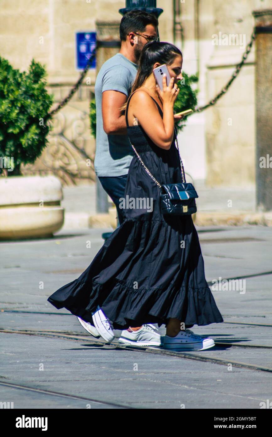 Seville Spain September 18, 2021 Pedestrians walking in the street ...