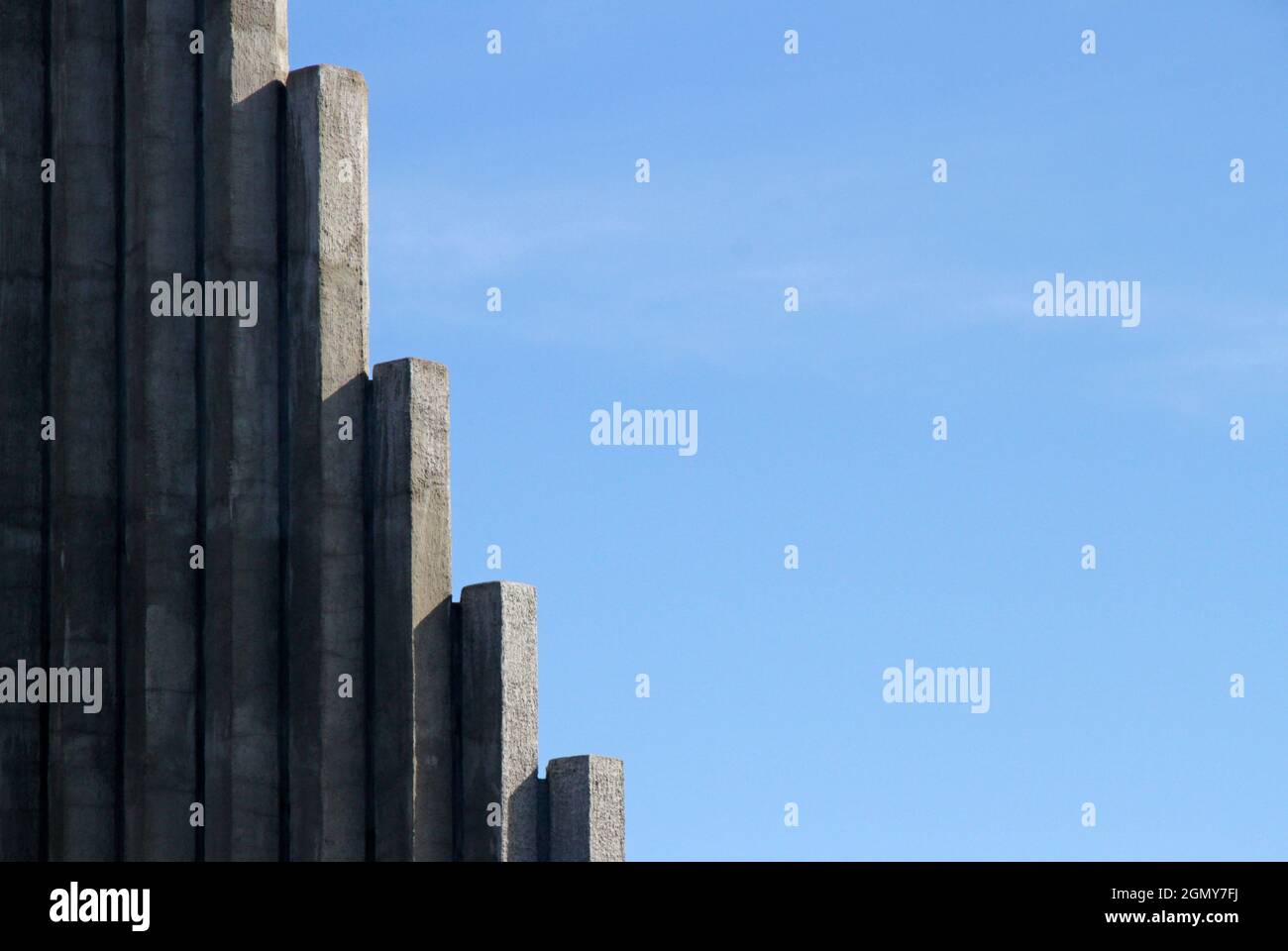 Increasingly smaller concrete columns on the side of Reykjavik's ...