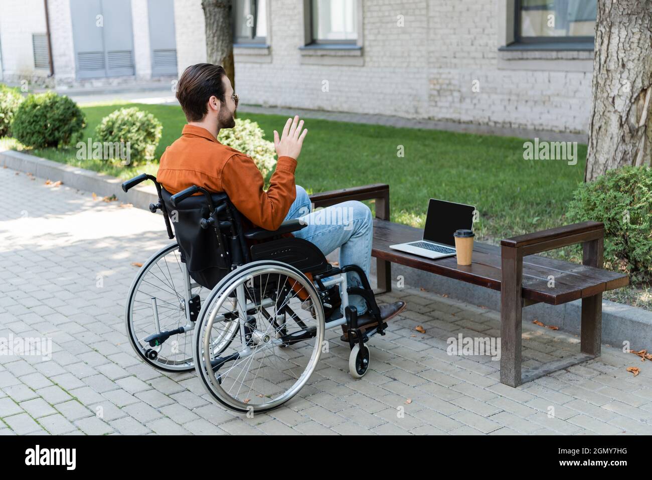 Handicapped man in wheelchair hi-res stock photography and images - Alamy