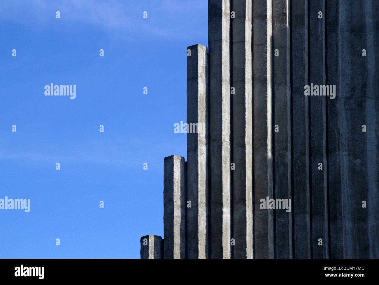 Increasingly larger concrete columns on the side of Reykjavik's ...