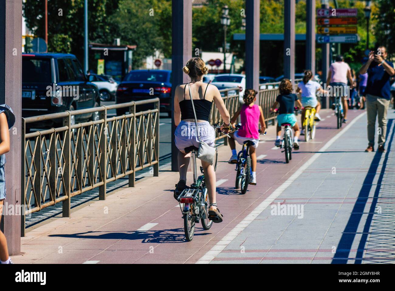 Seville Spain September 18, 2021 People rolling with a bicycle in the ...