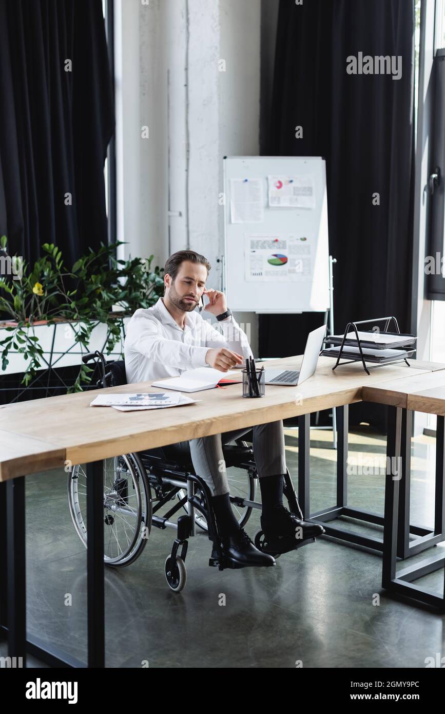 Business graphs person wheelchair hi-res stock photography and images ...