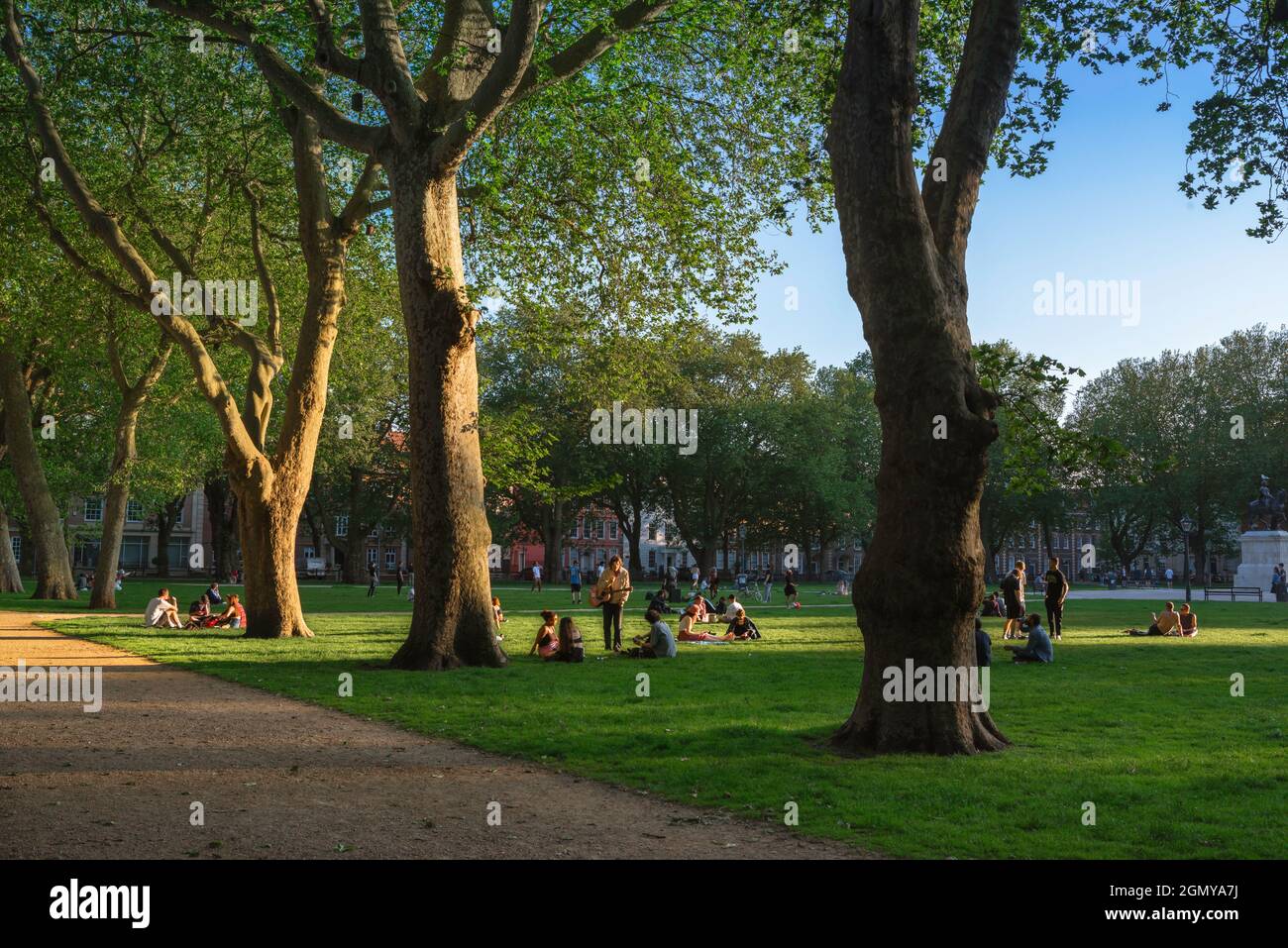 Queen Square Bristol, view of people relaxing on a summer evening in ...