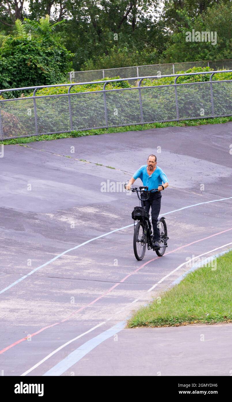 A middle age man exercises on a CYCLETE, a stand-up bike which claims ...