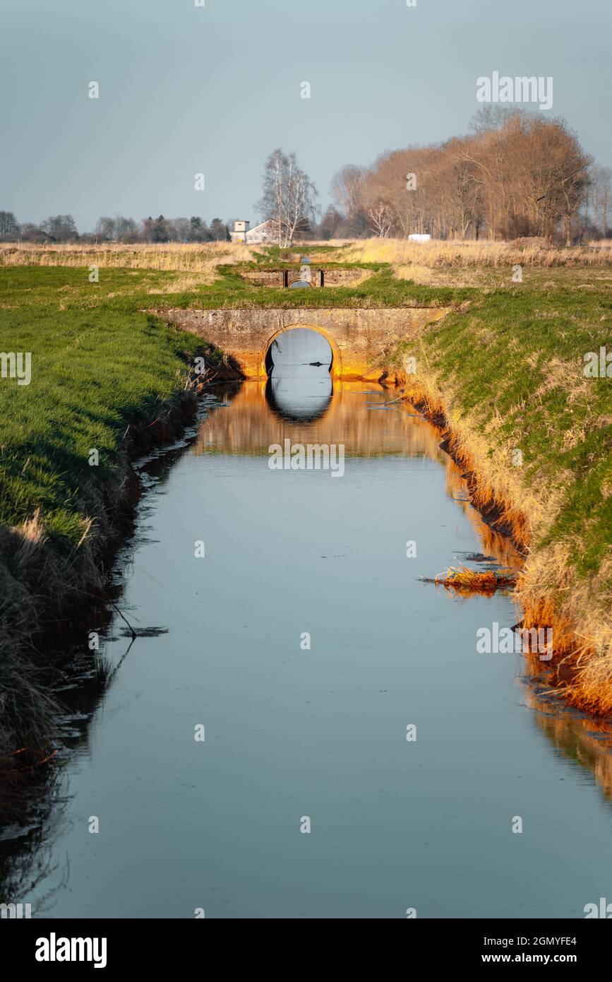 water canal in arable fields Stock Photo - Alamy