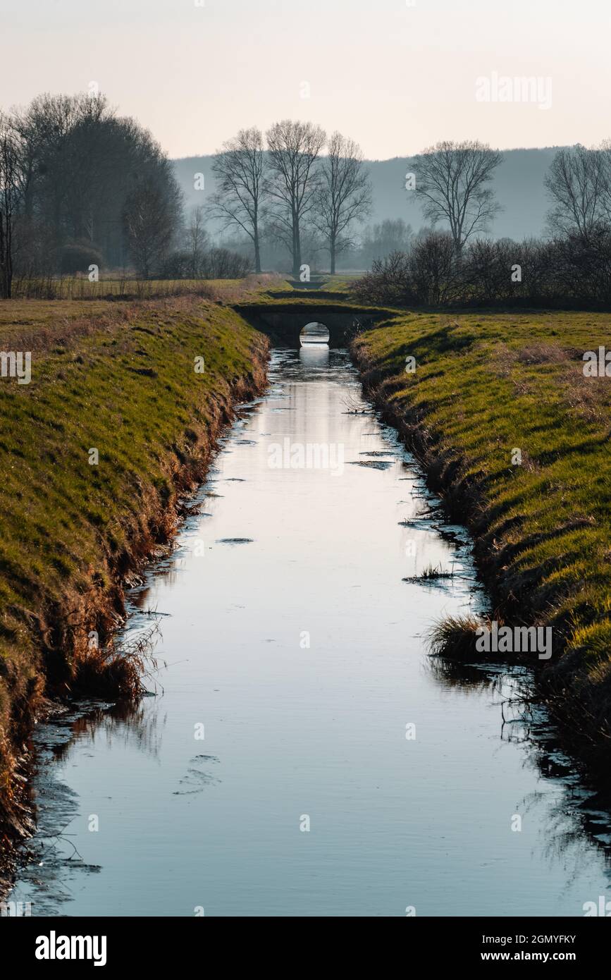 water canal in arable fields Stock Photo - Alamy