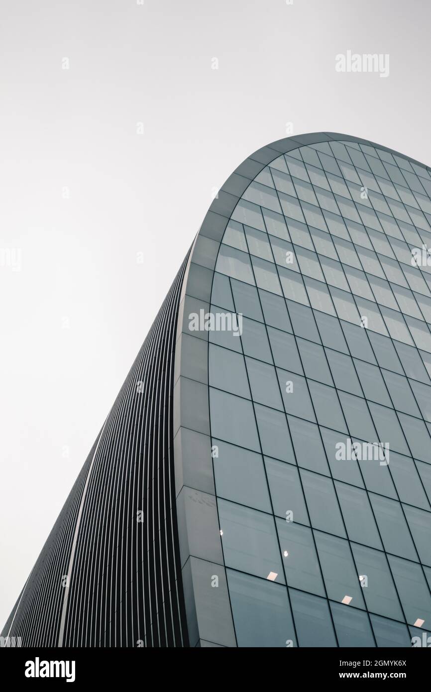 Modern building with an abstract facade in the city Stock Photo - Alamy