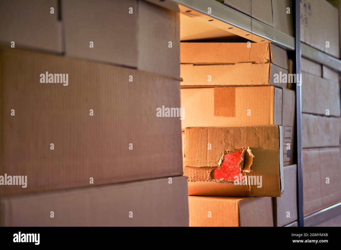 Stealing parcels and damaging the packaging of goods in the warehouse ...