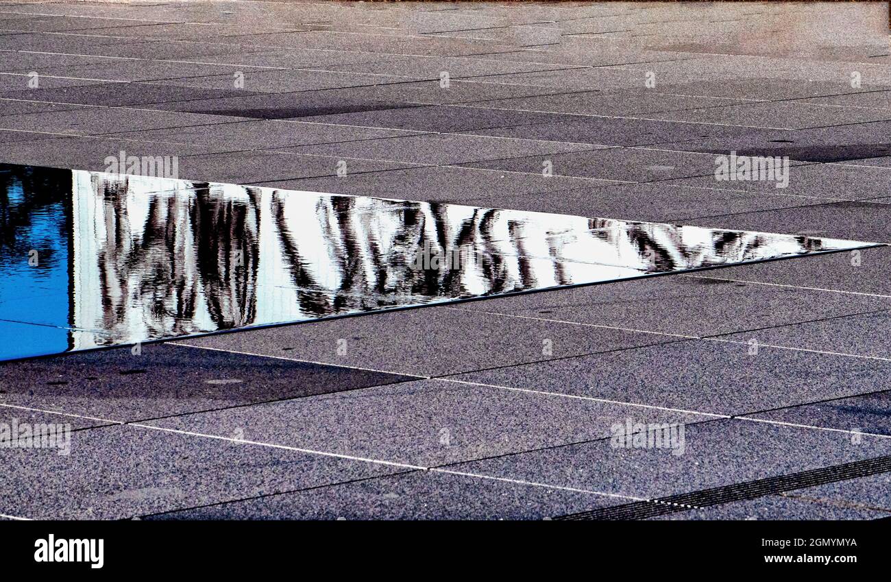 Gravity pool in a concrete park plaza Stock Photo - Alamy