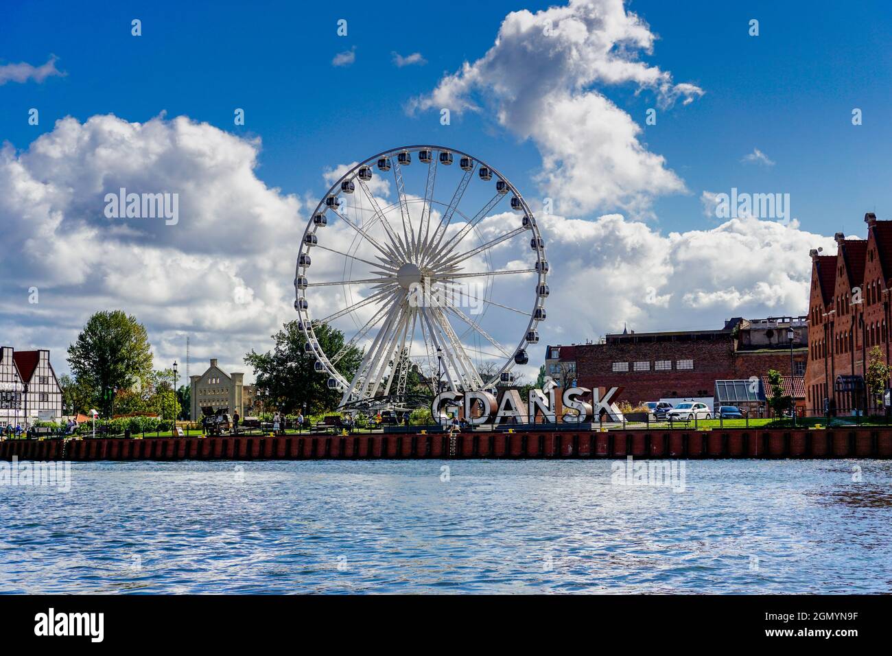 Danzig, Poland - 2 September, 2021: ferris wheel and historic buildings ...