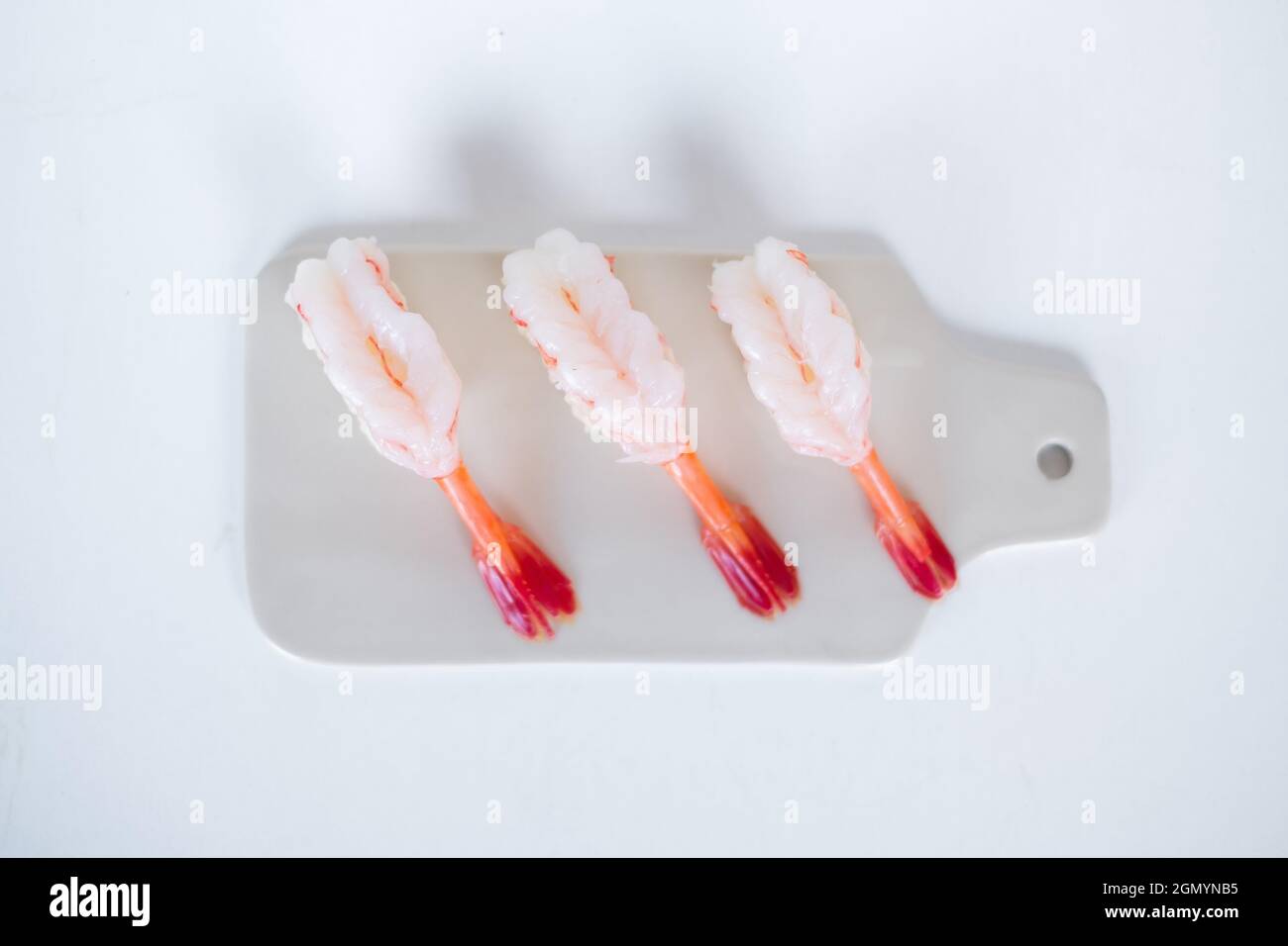 Raw Shrimp prawn sushi in japanese restaurant. Sushi - ama Ebi Nigiri ...