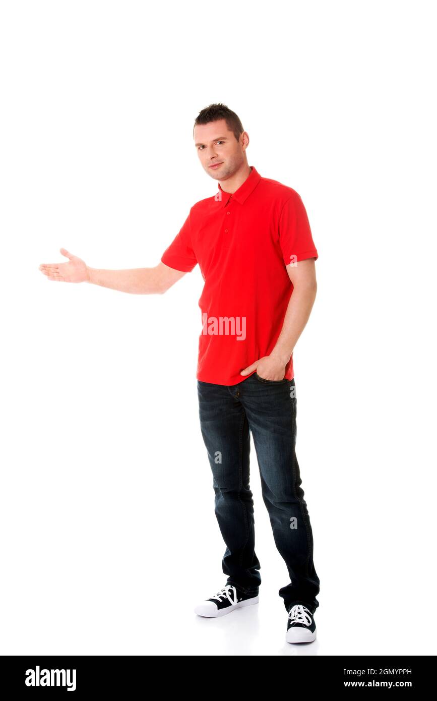 Handsome Polish man wearing red polo showing open palm isolated on ...