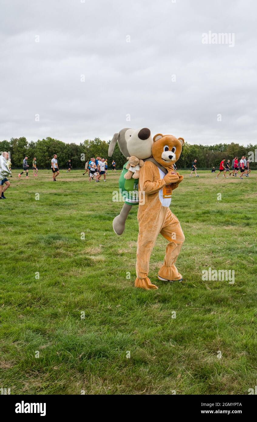 Runner in a fancy dress costume getting ready to participate in the ...