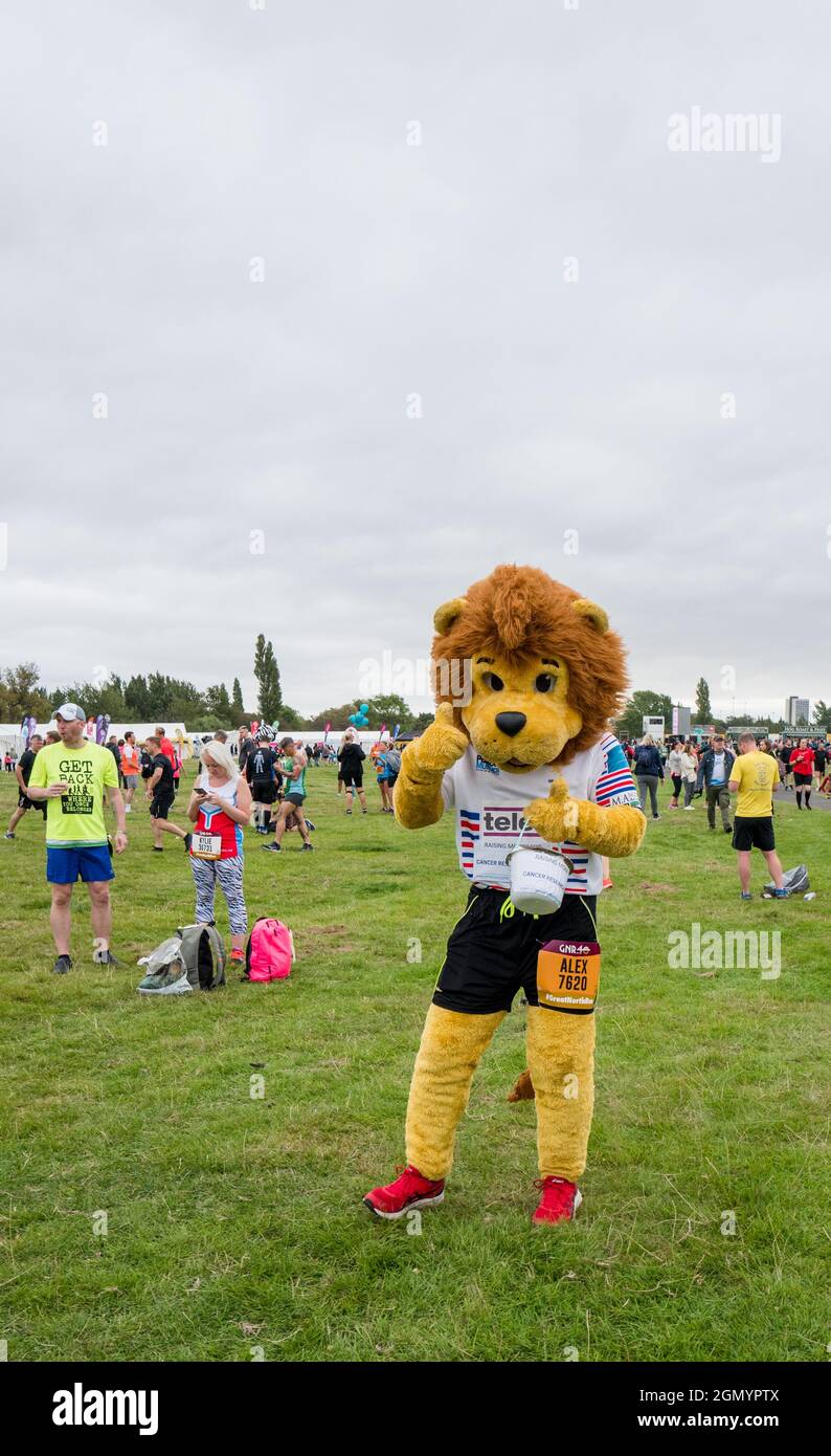 Runner in a fancy dress costume getting ready to participate in the ...
