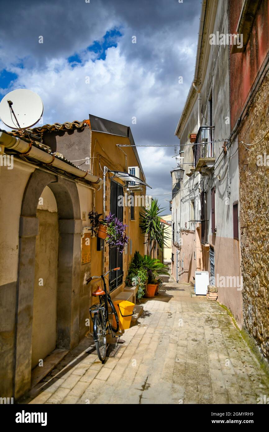 A narrow street in Lavello, an old town in Basilicata region, Italy ...