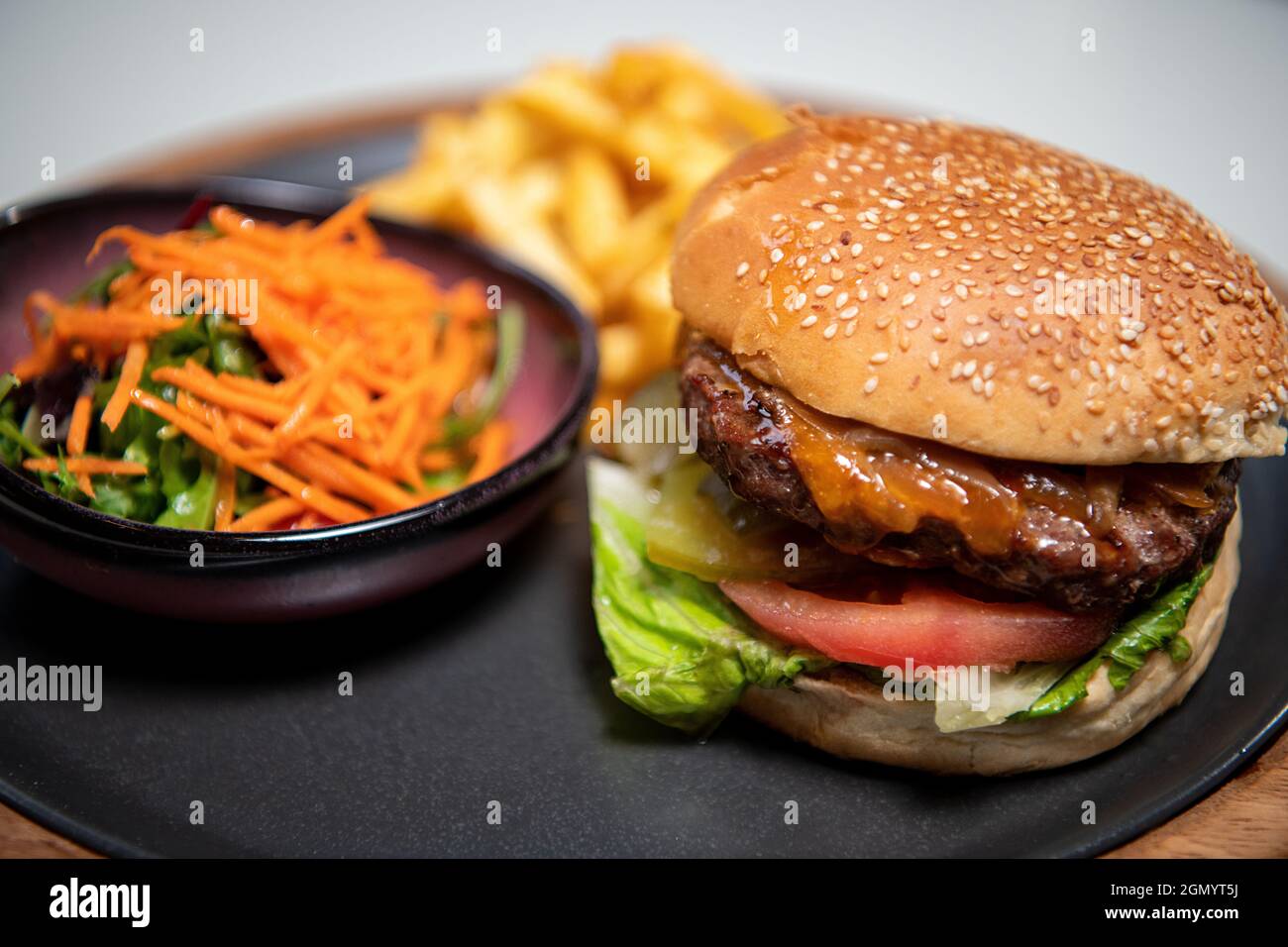 Craft beef burger and French fries Stock Photo - Alamy