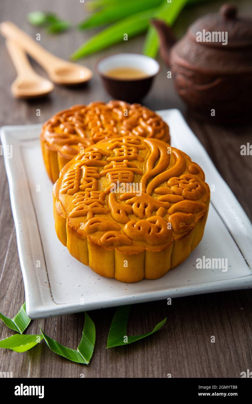 Moon cakes with Chinese tea. The Chinese character on the mooncake ...