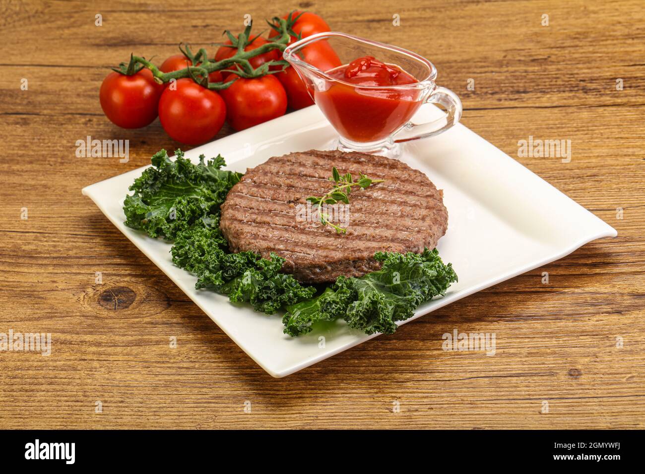 Grilled tasty beef cutlet for burger Stock Photo - Alamy