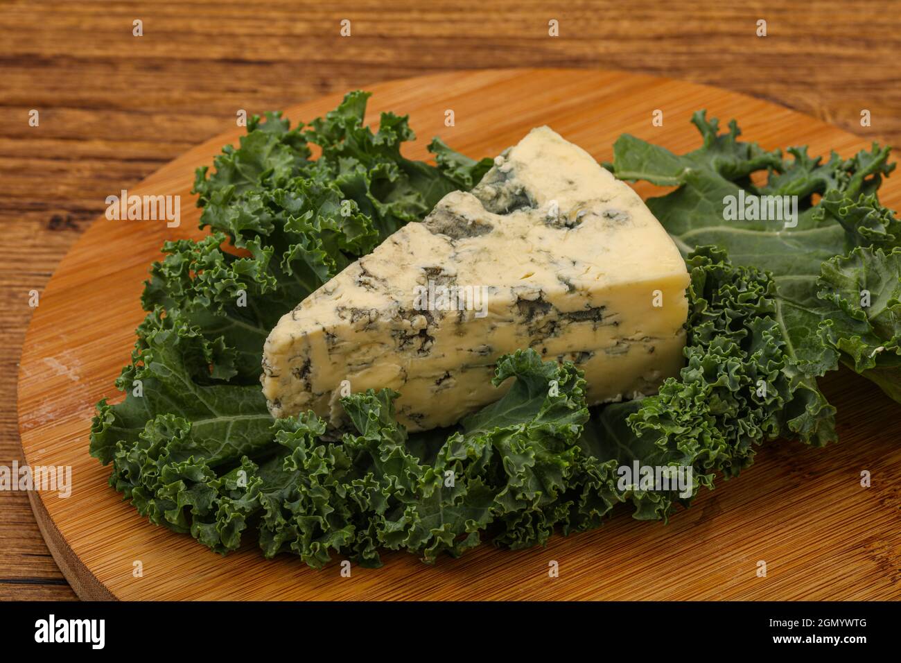 Dairy Blue cheese triangle with mold Stock Photo - Alamy