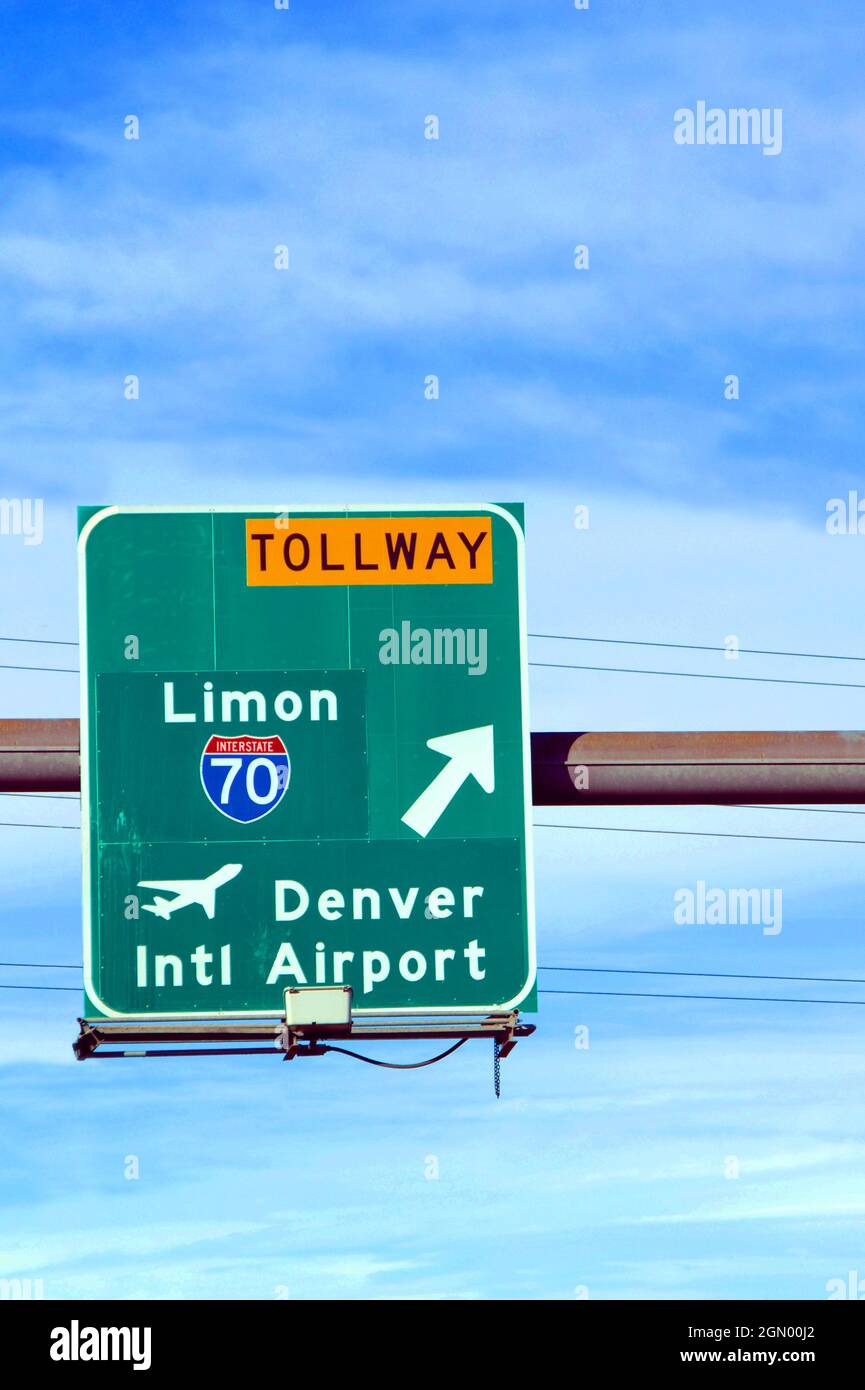 Interstate sign points toward the Denver International Airport in ...