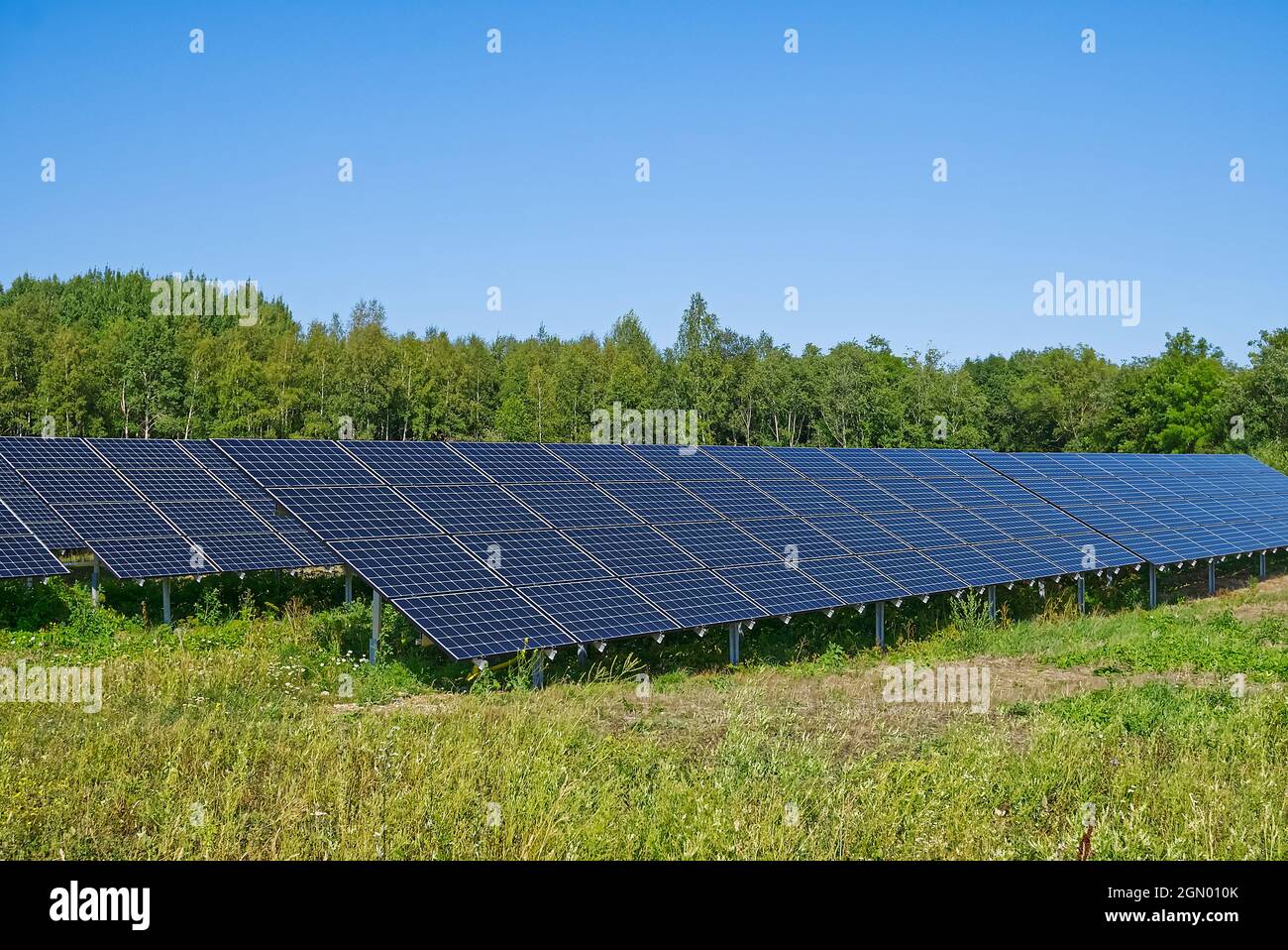 Solar power plant in summer day. Photovoltaic panels for renewable ...