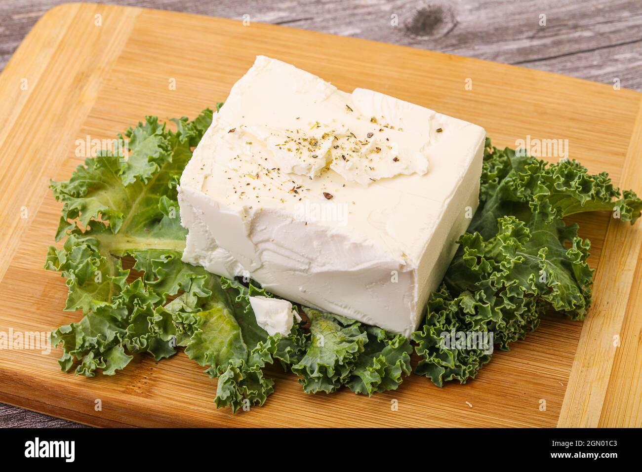 Traditional tasty Greek Feta soft cheese brick Stock Photo - Alamy