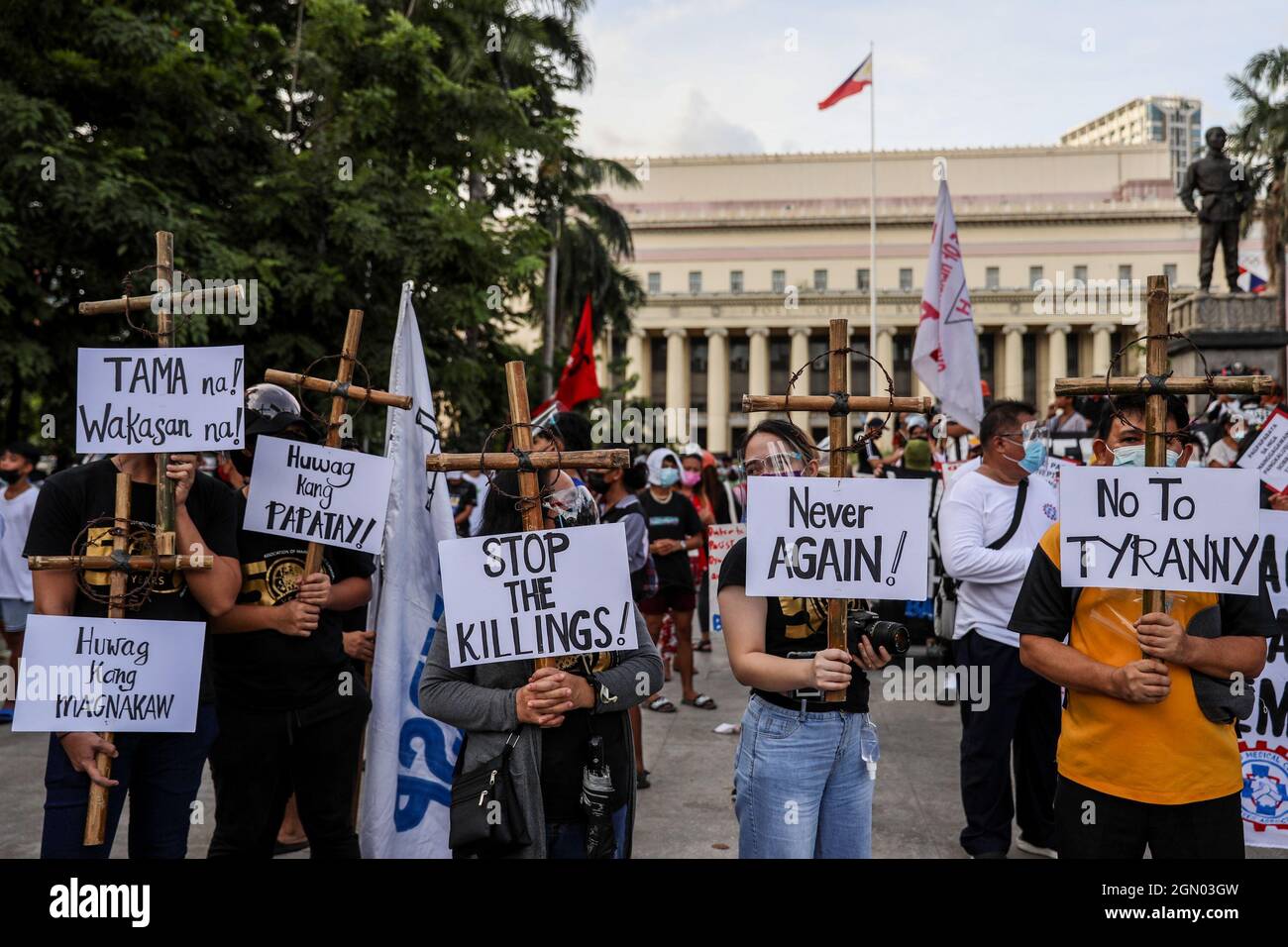 September 21, 2021: Filipino activists hold signs during a protest in ...