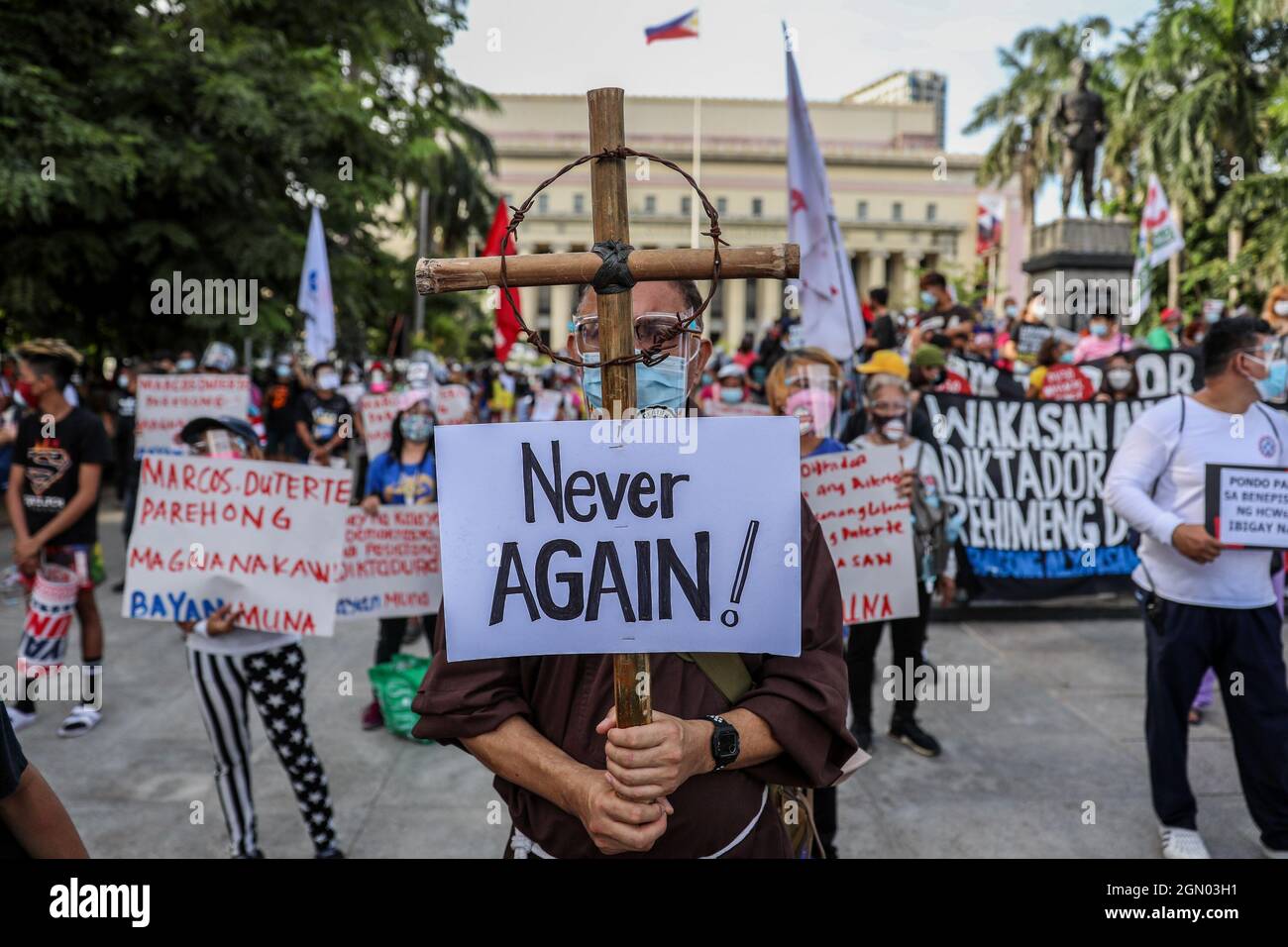 September 21, 2021: Filipino activists hold signs during a protest in ...