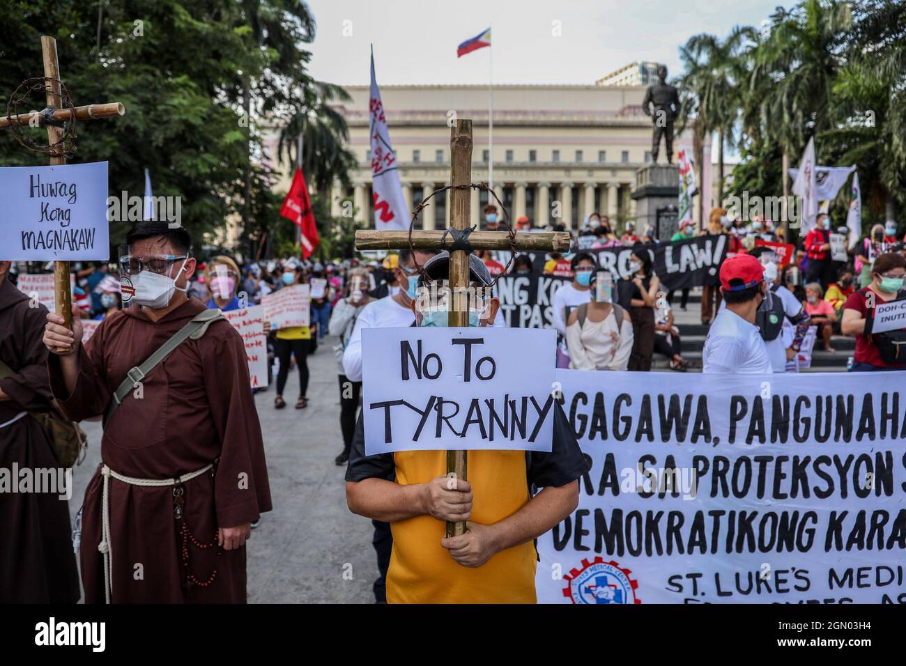 September 21, 2021: Filipino activists hold signs during a protest in ...