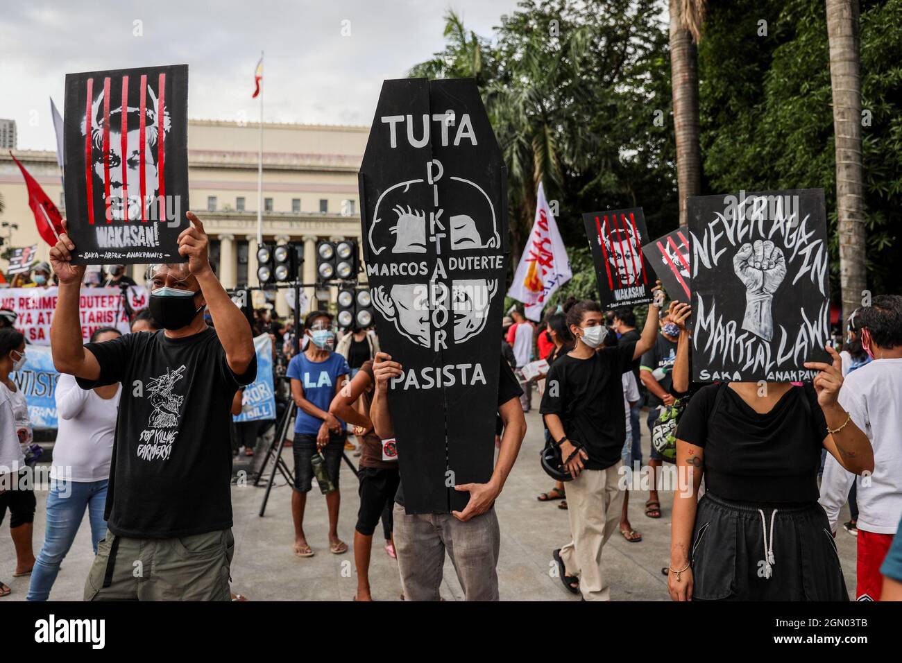 September 21, 2021: Filipino activists hold signs during a protest in ...